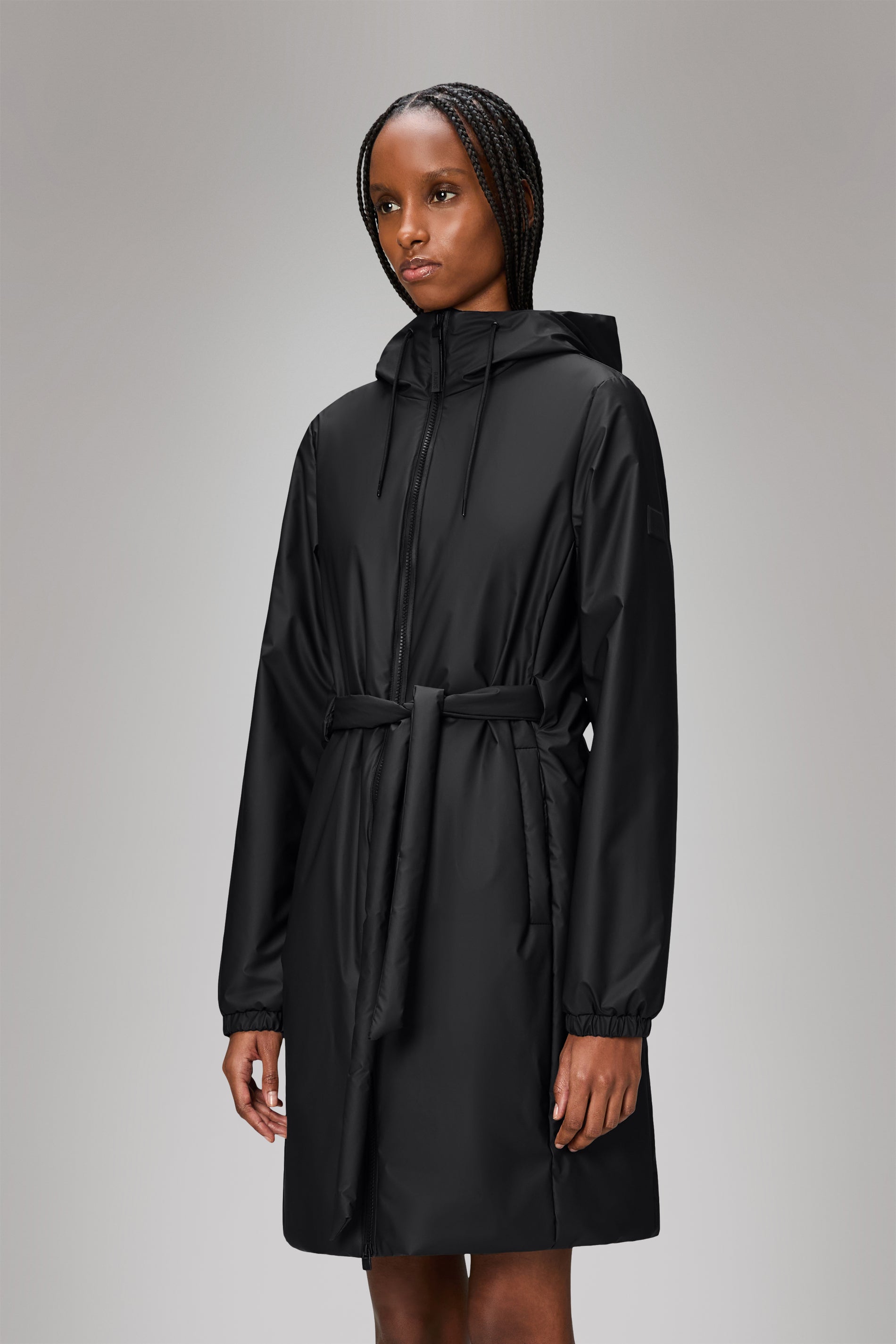 Rains® Lohja Long Insulated Curve Jacket in Black for $350 | Free Shipping